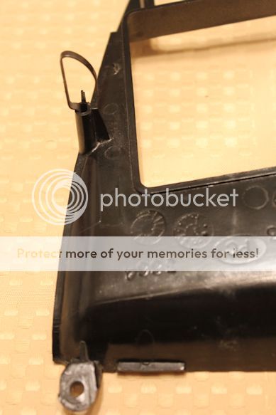 Source for accessory trim plate (radio bezel) "spring clips ...